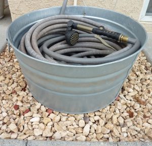 9 DIY Garden Hose Storage Ideas ⋆ Bright Stuffs